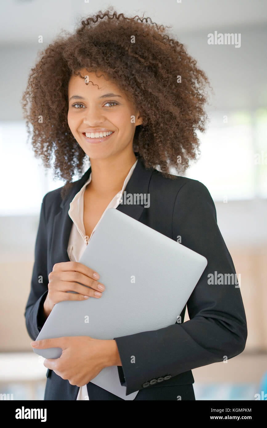 Portrait of attractive mixed-race businesswoman Stock Photo - Alamy