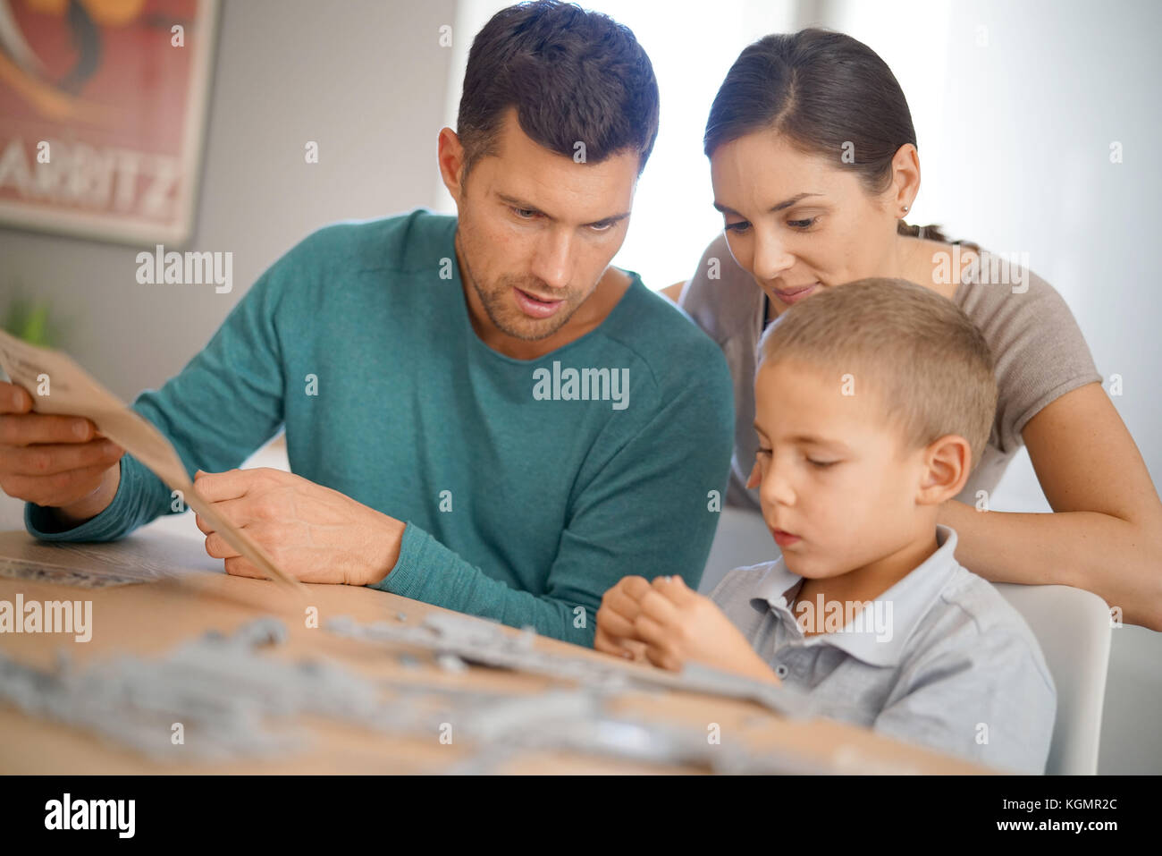 Child building airplane model hi-res stock photography and images - Alamy