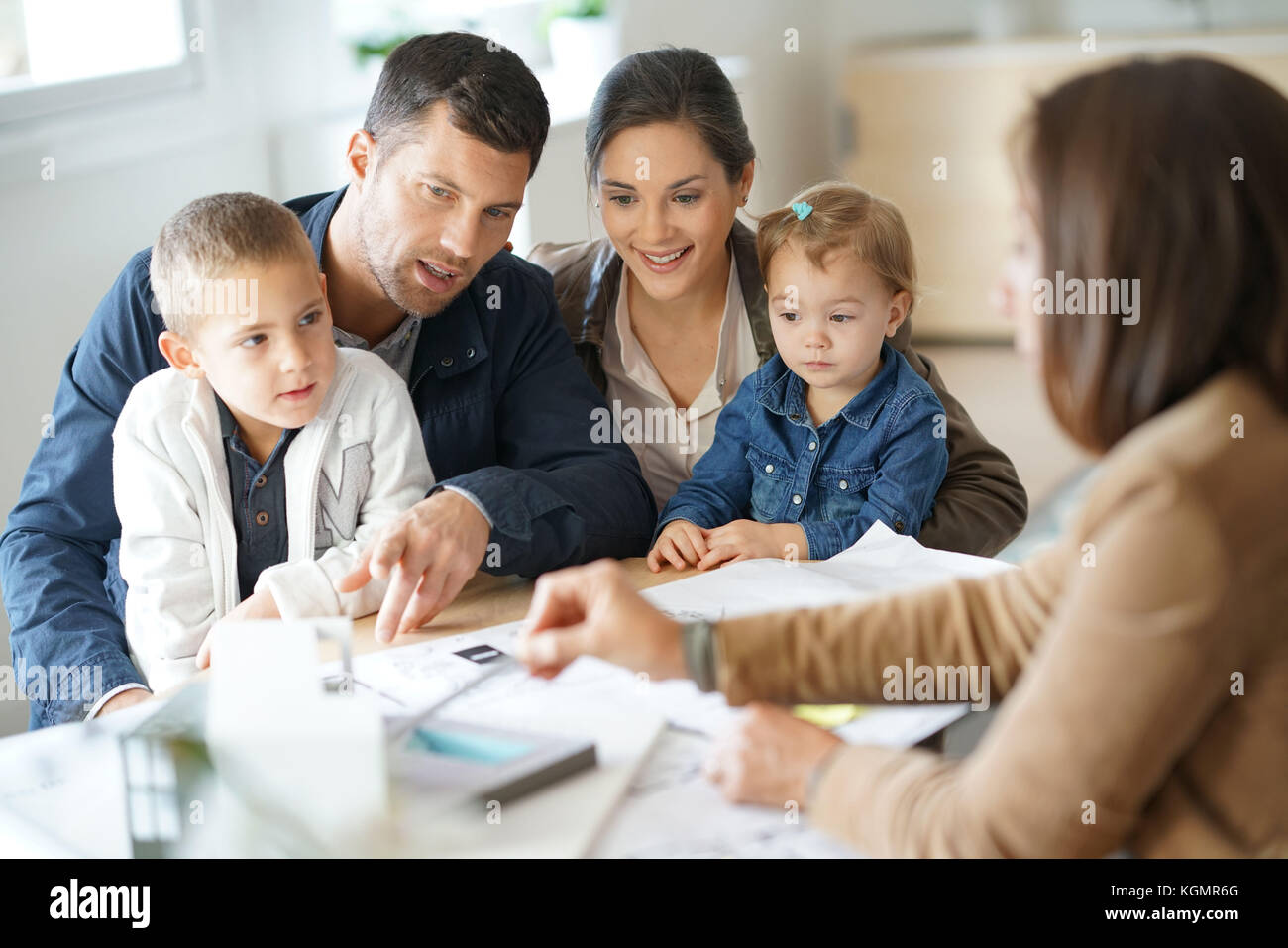 Family meeting architect for house project Stock Photo - Alamy
