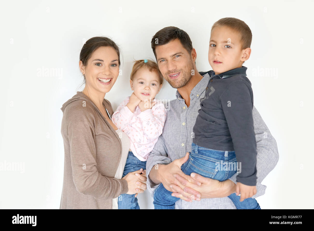 Portrait of happy family of four on white background Stock Photo - Alamy