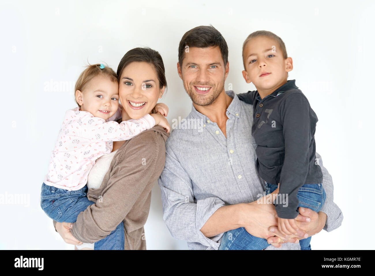 Portrait of happy family of four on white background Stock Photo - Alamy