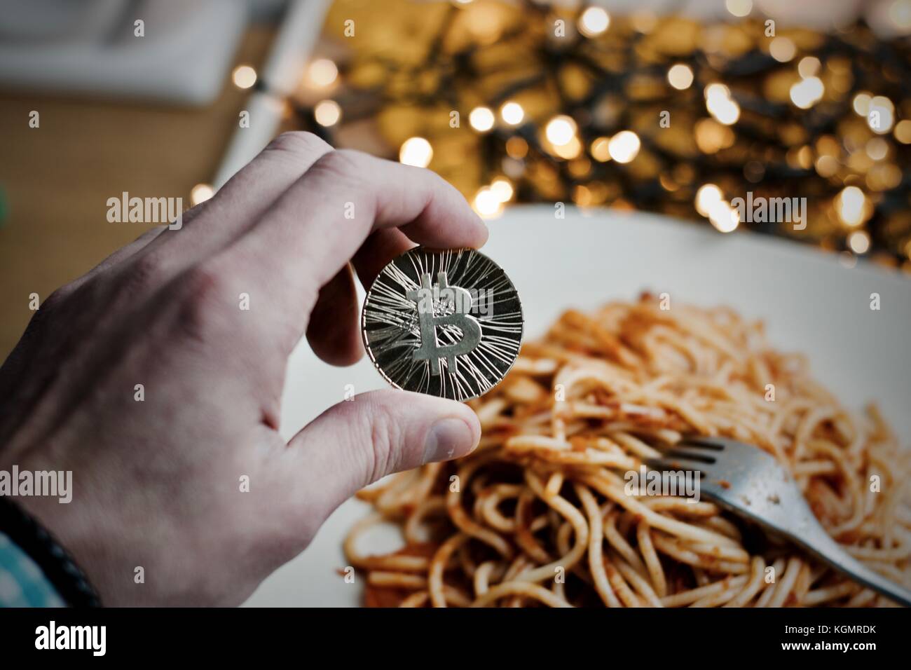 Digital currency physical metal bitcoin coin. Restaurant pasta concept ...