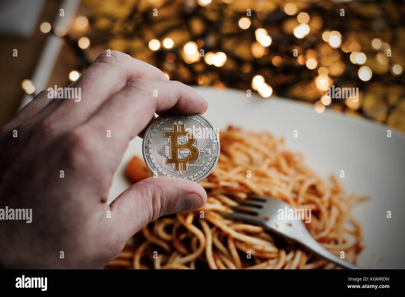 Digital currency physical metal bitcoin coin. Restaurant pasta concept ...
