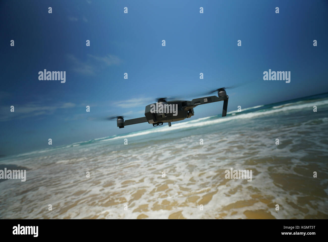 Drone flying over the ocean Stock Photo - Alamy