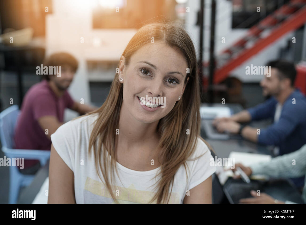 Office worker looking at camera hi-res stock photography and images - Alamy