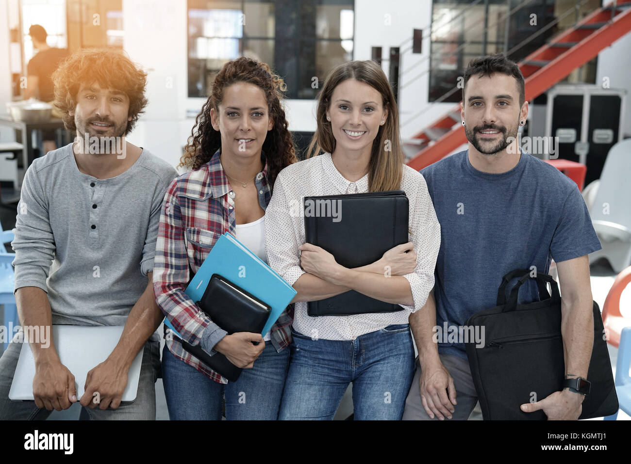 Group of students in business training standing in office Stock Photo ...