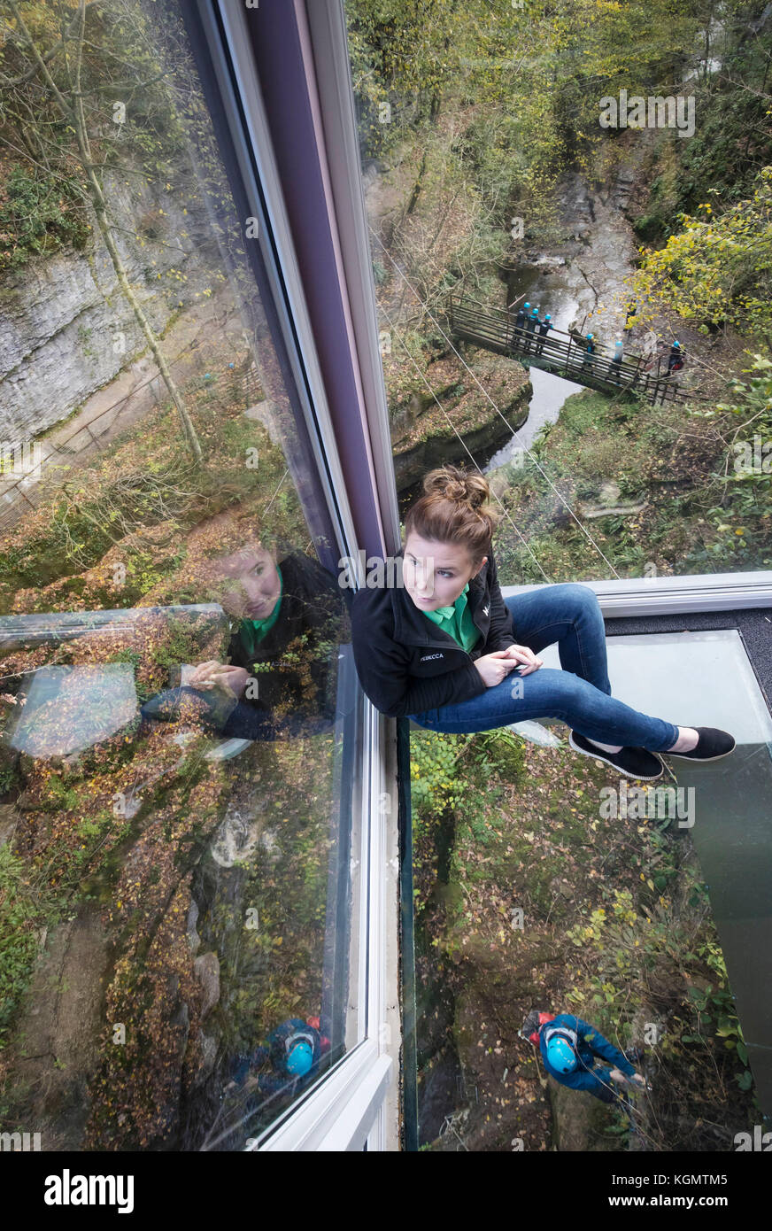 Rebecca Verity sits on the glass floor of a new cantilevered extension ...