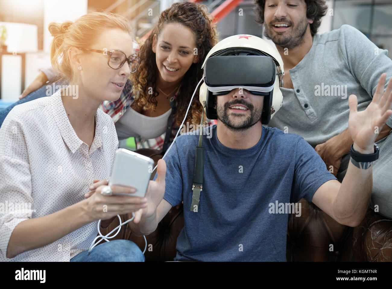 Group young friends playing virtual hi-res stock photography and images ...