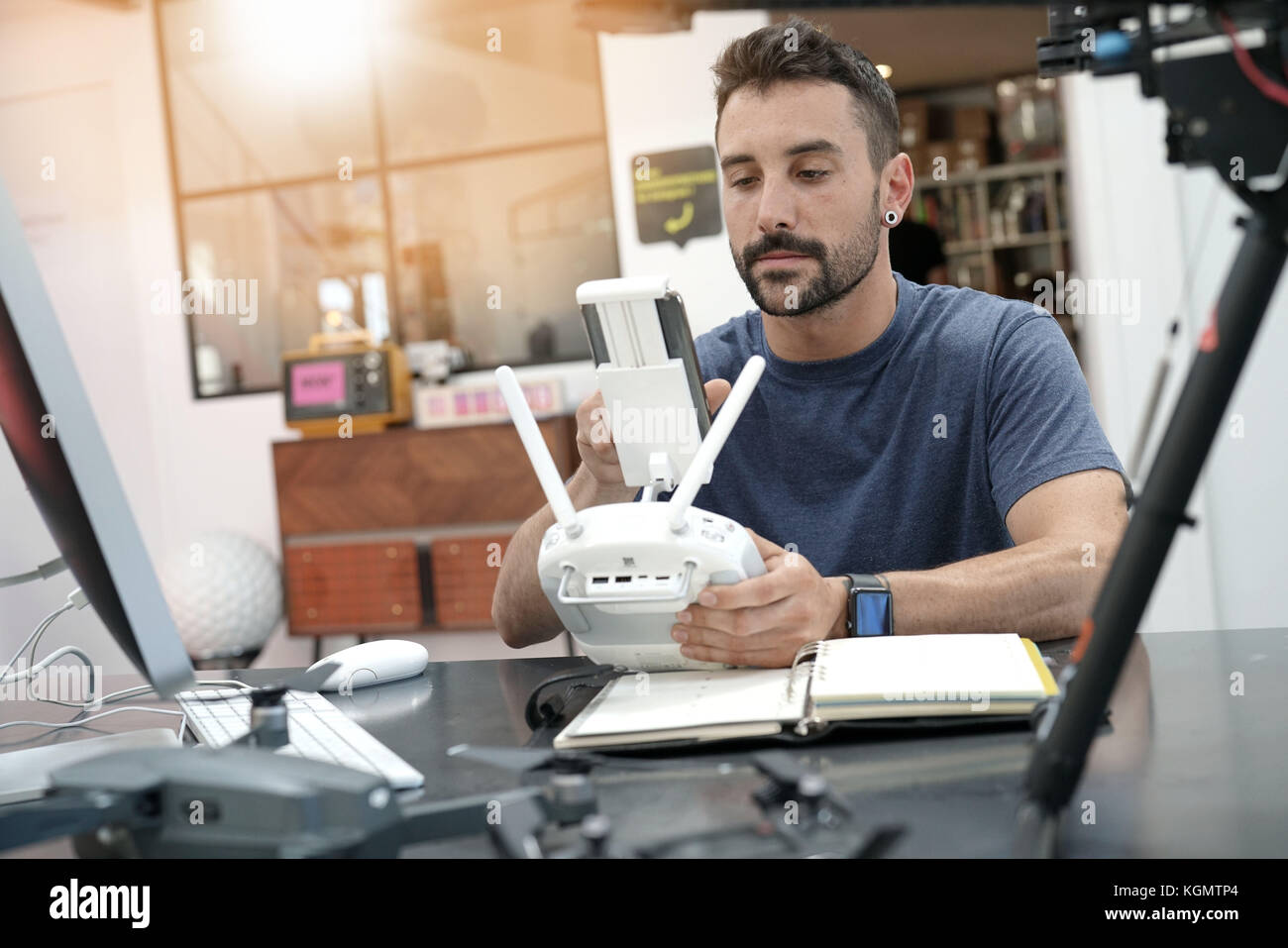 Engineer working on drone in lab Stock Photo - Alamy