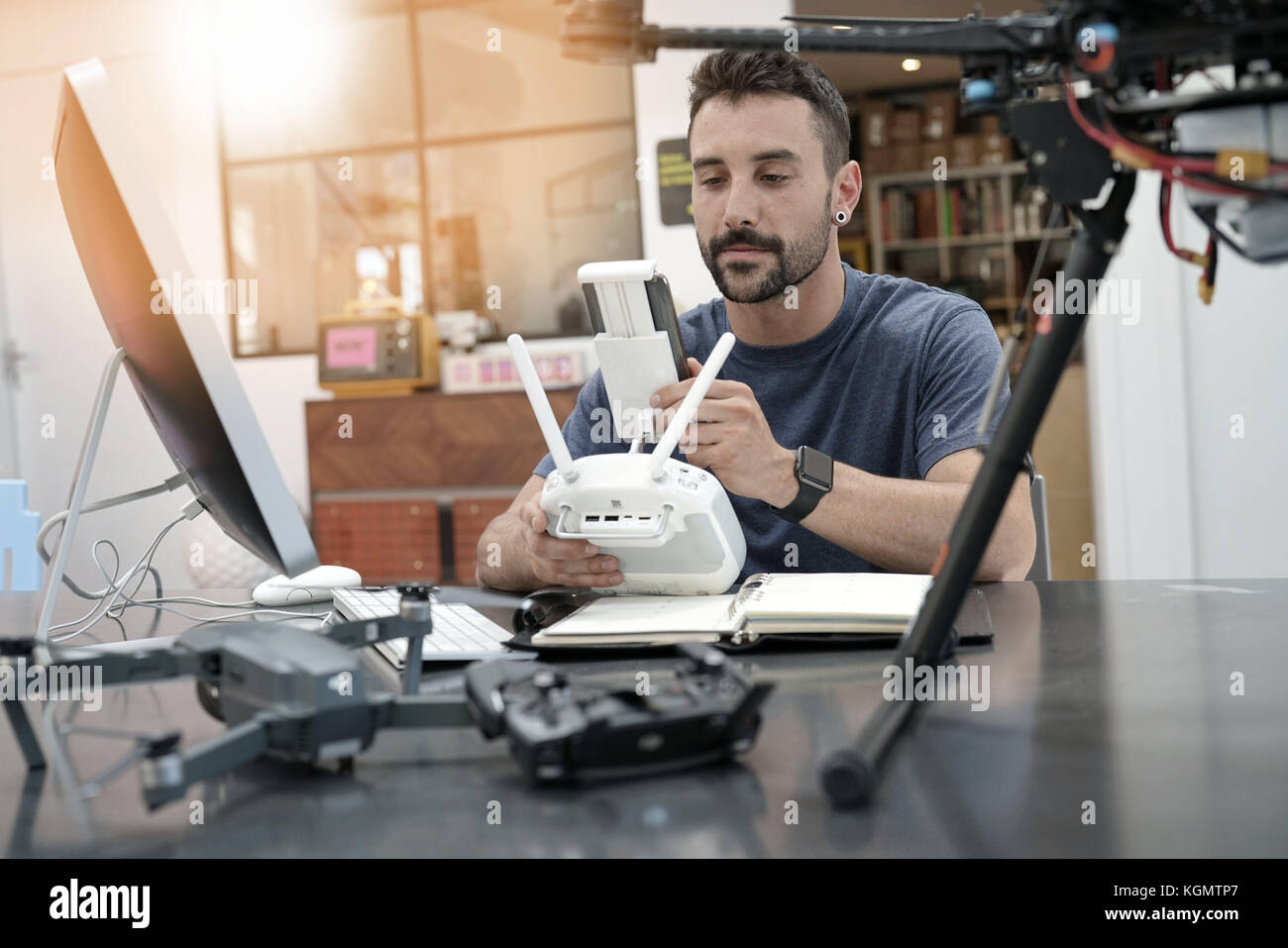 Engineer working on drone in lab Stock Photo - Alamy