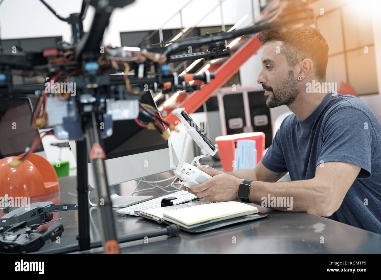 Engineer working on drone in lab Stock Photo - Alamy