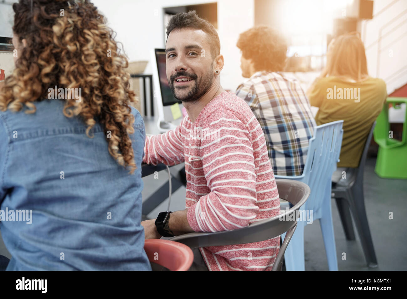 Portrait of man working in office, start-up Stock Photo - Alamy