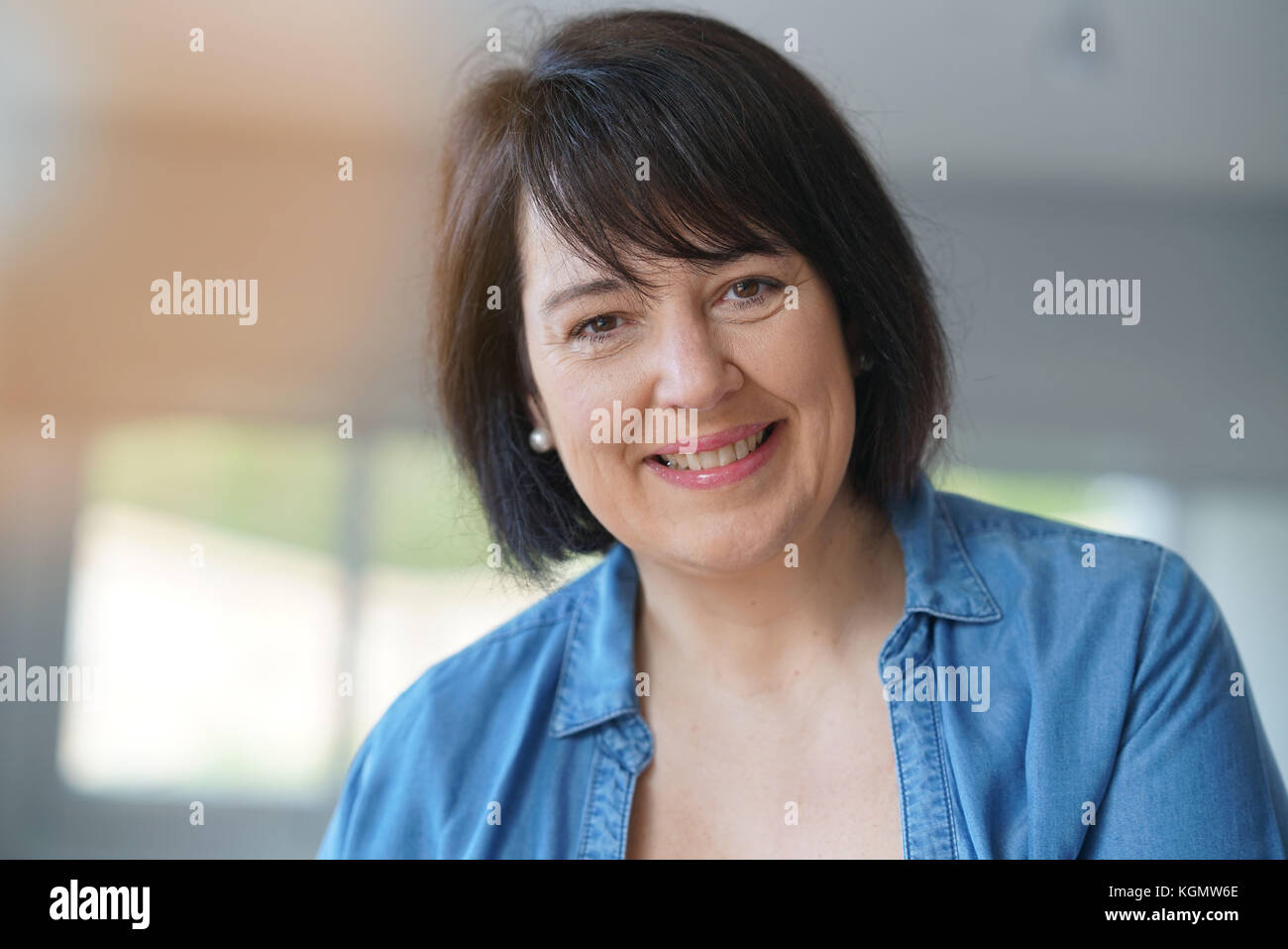 Portrait of smiling 50-year-old woman Stock Photo - Alamy