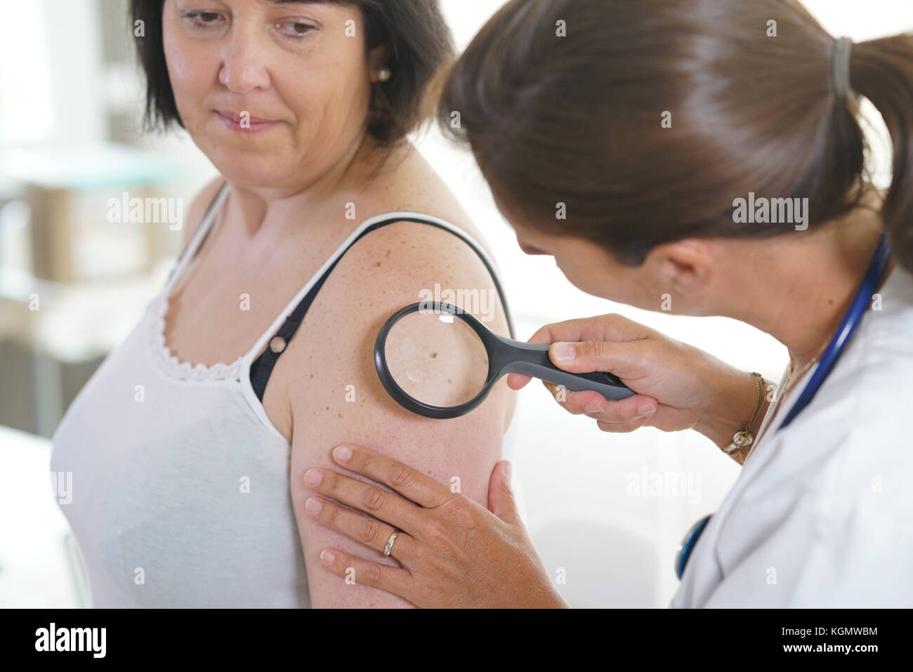 Dermatologist skin exam hi-res stock photography and images - Alamy