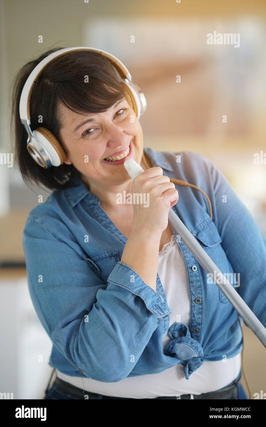 Woman sweeping floor hi-res stock photography and images - Alamy