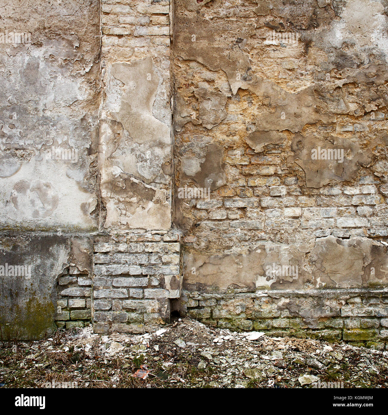 Old weathered wall of bricks and a ground Stock Photo - Alamy