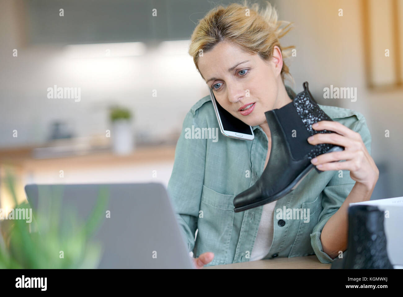 Woman on the phone with customer service department Stock Photo - Alamy