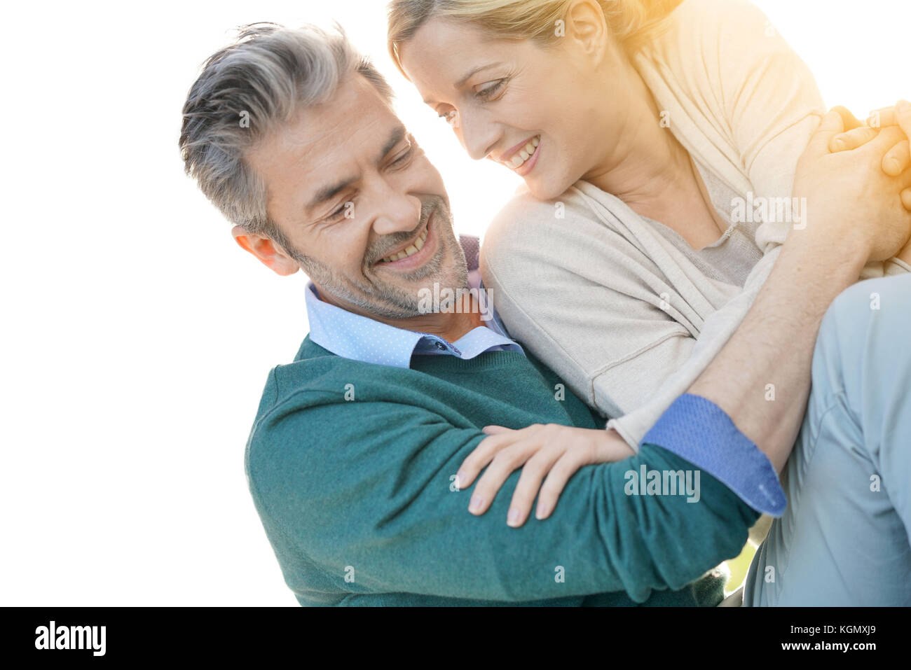 Middle-aged couple embracing each other Stock Photo - Alamy