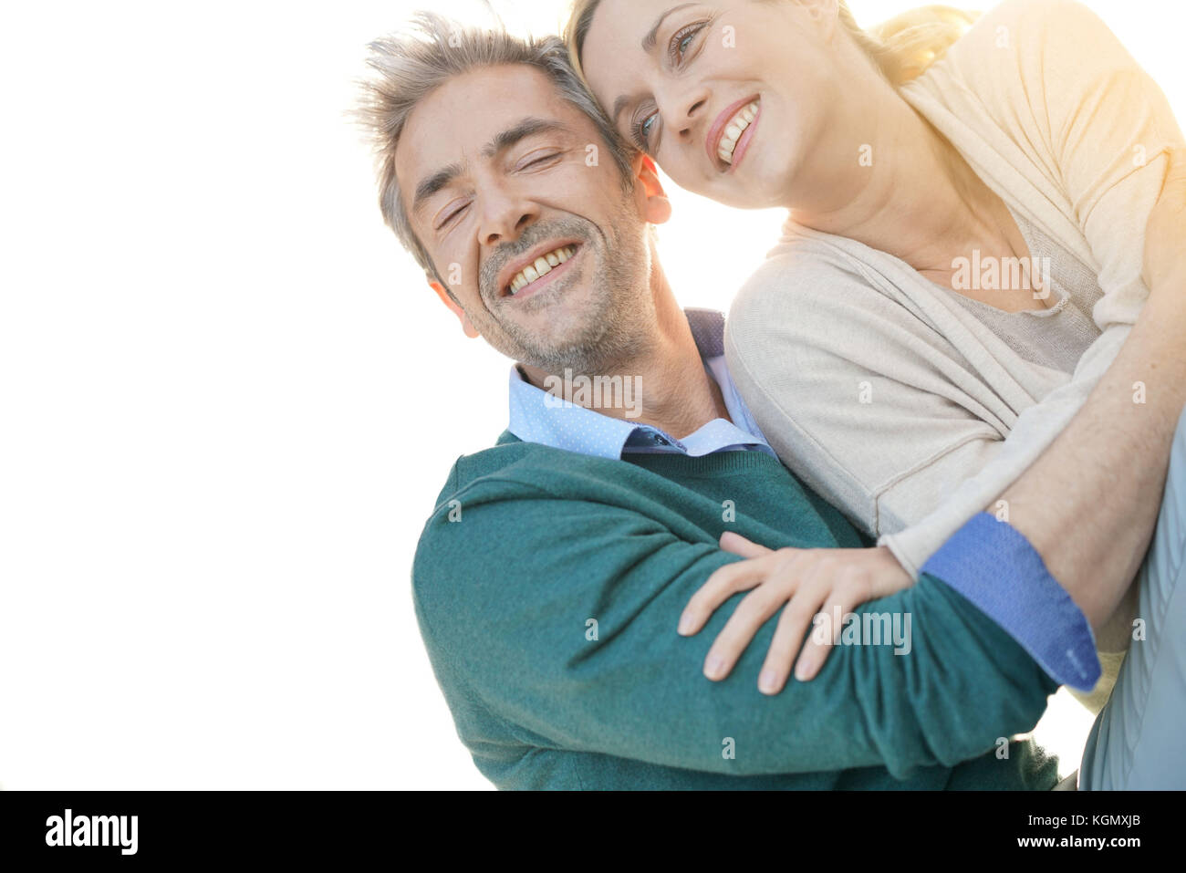 Middle-aged couple embracing each other Stock Photo - Alamy