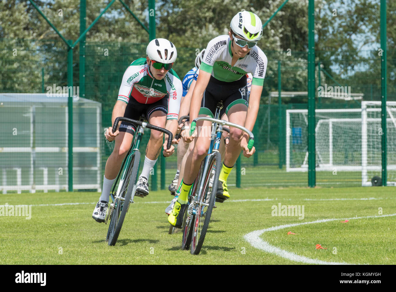 Male grass track cyclists racing in a competition at Kent University ...