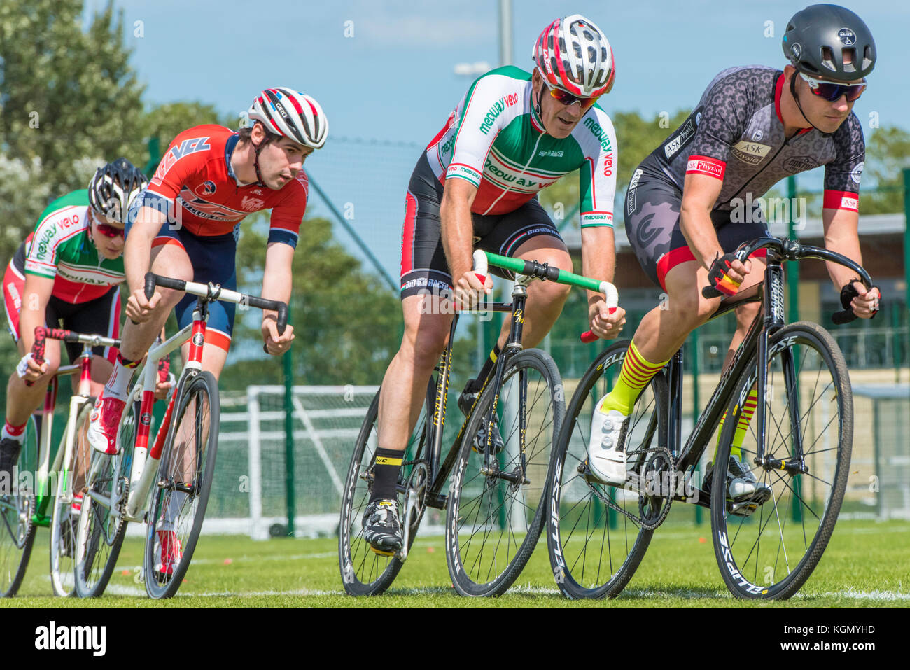 Male grass track cyclists racing in a competition at Kent University ...