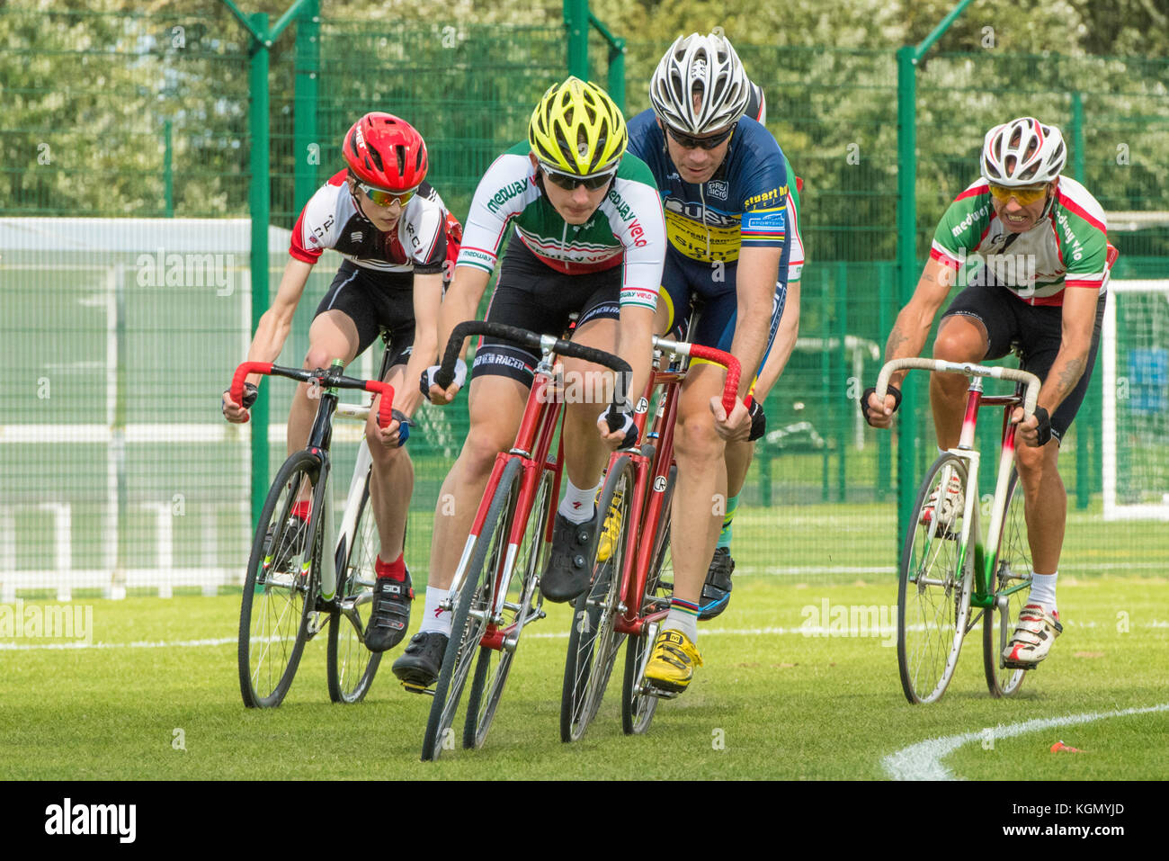 Male grass track cyclists racing in a competition at Kent University ...
