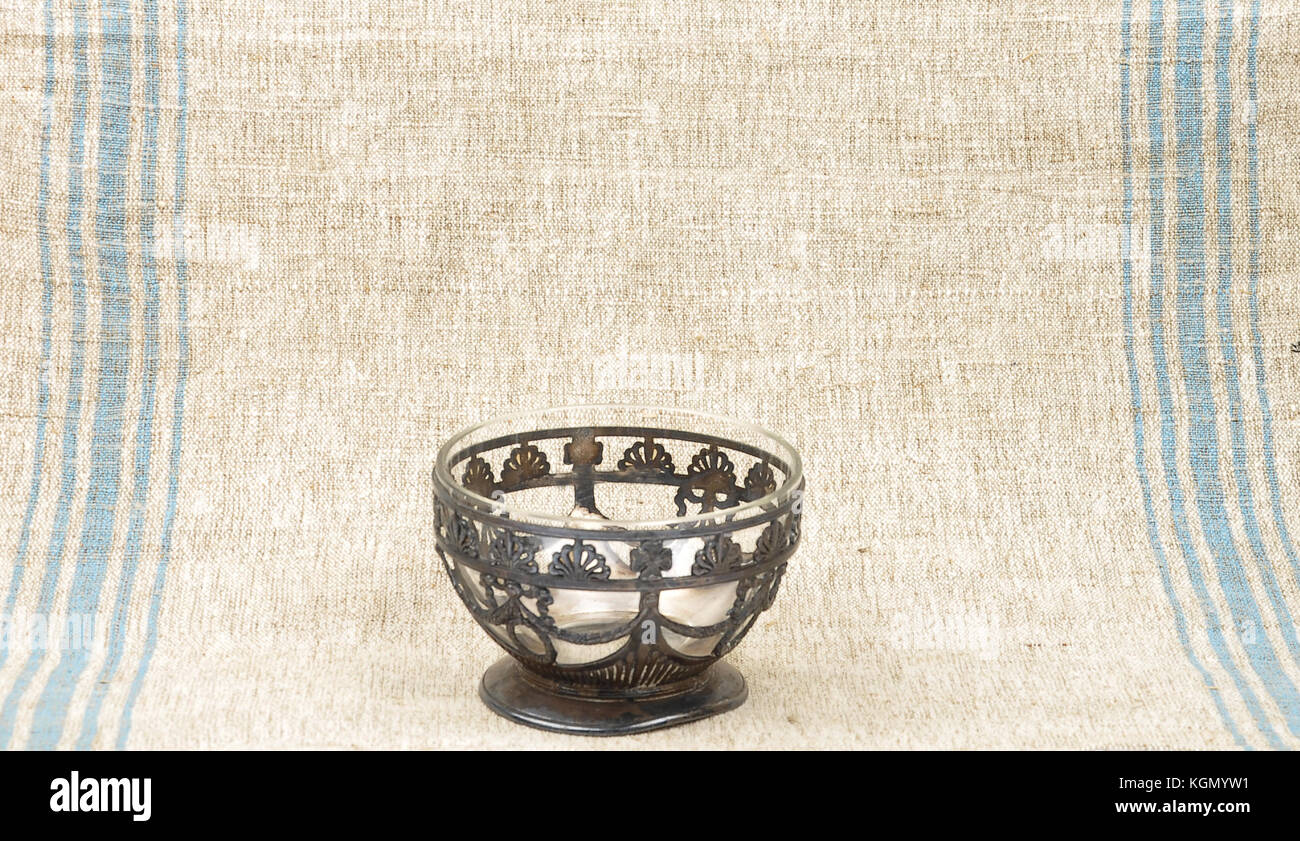 Bowl of glass on linen sheet Stock Photo - Alamy