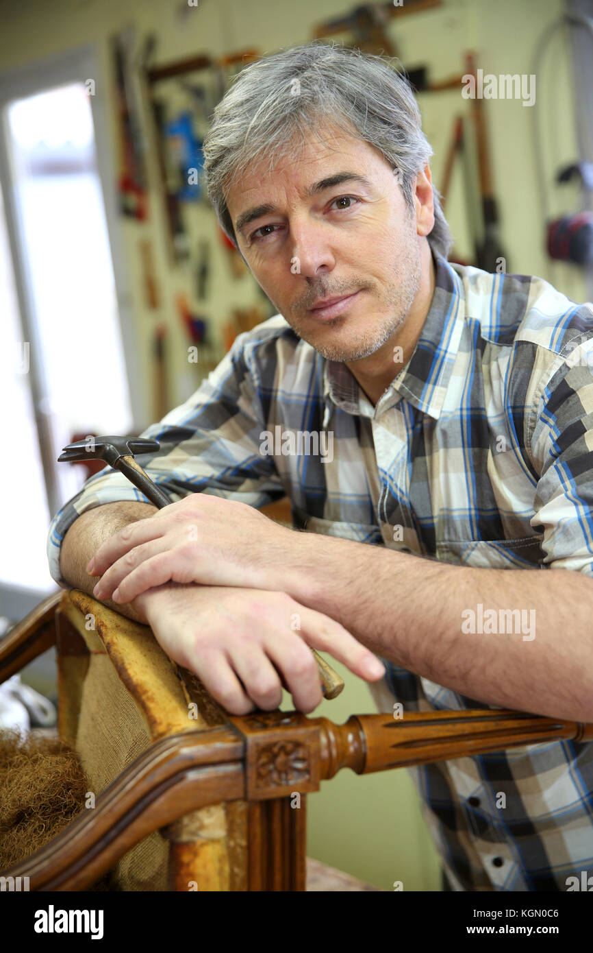 Portrait of craftsman in workshop Stock Photo - Alamy