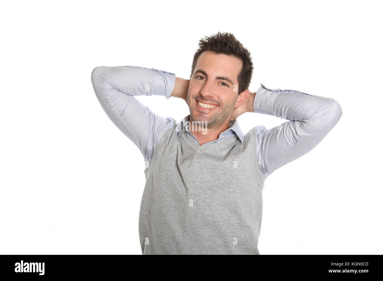 Handsome guy with arms behind head Stock Photo - Alamy