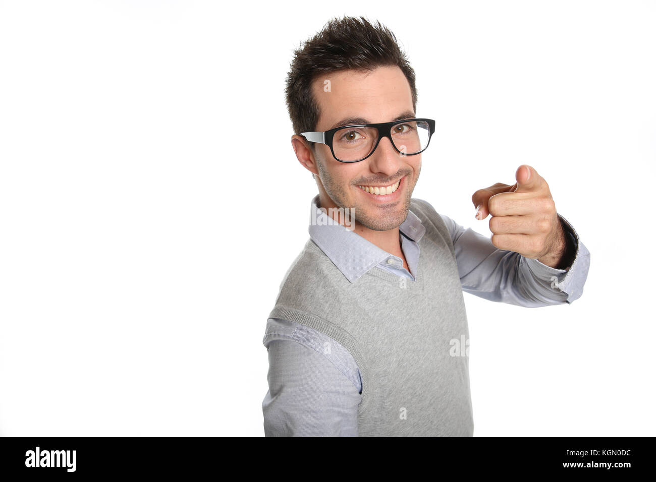 Handsome guy presenting something to camera Stock Photo - Alamy