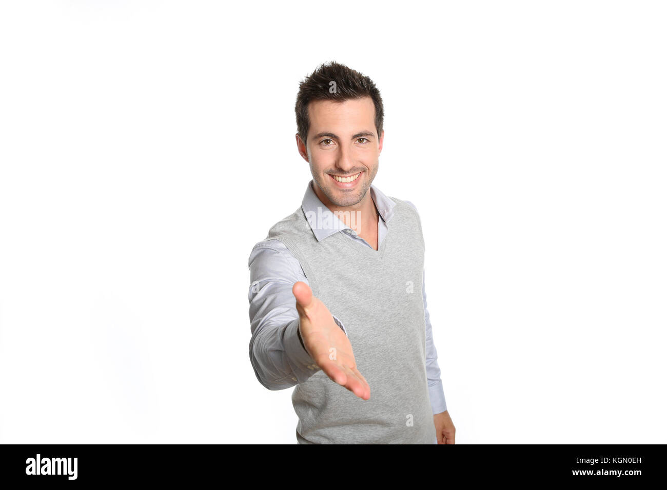 Closeup of man giving hand for handshake Stock Photo - Alamy