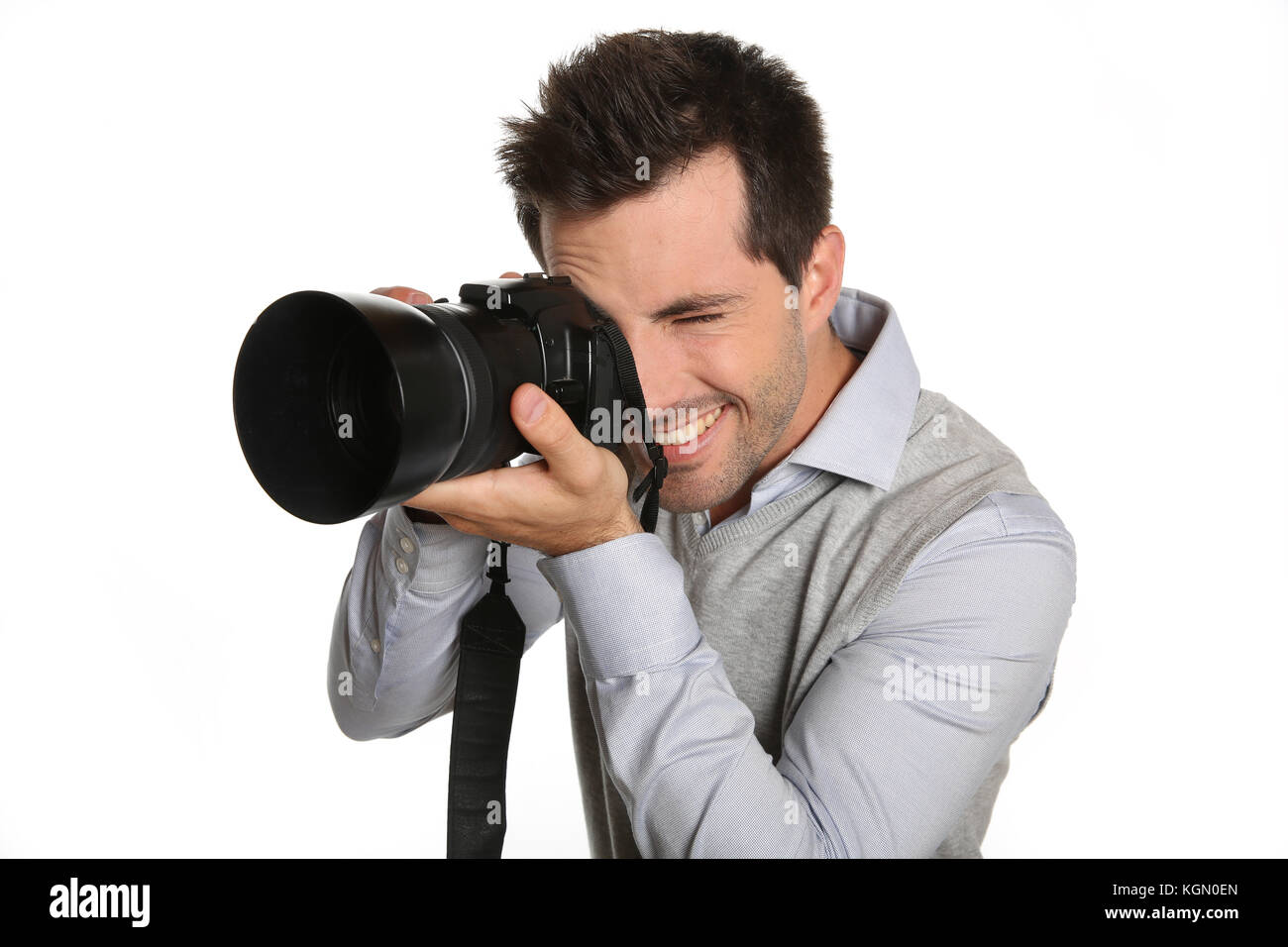 Portrait of photographer holding digital camera Stock Photo - Alamy