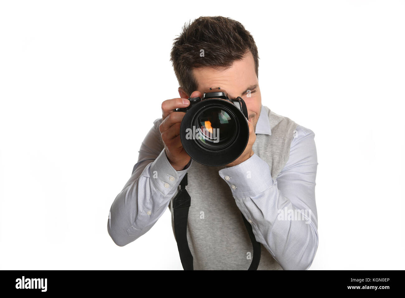 Portrait of photographer holding digital camera Stock Photo - Alamy