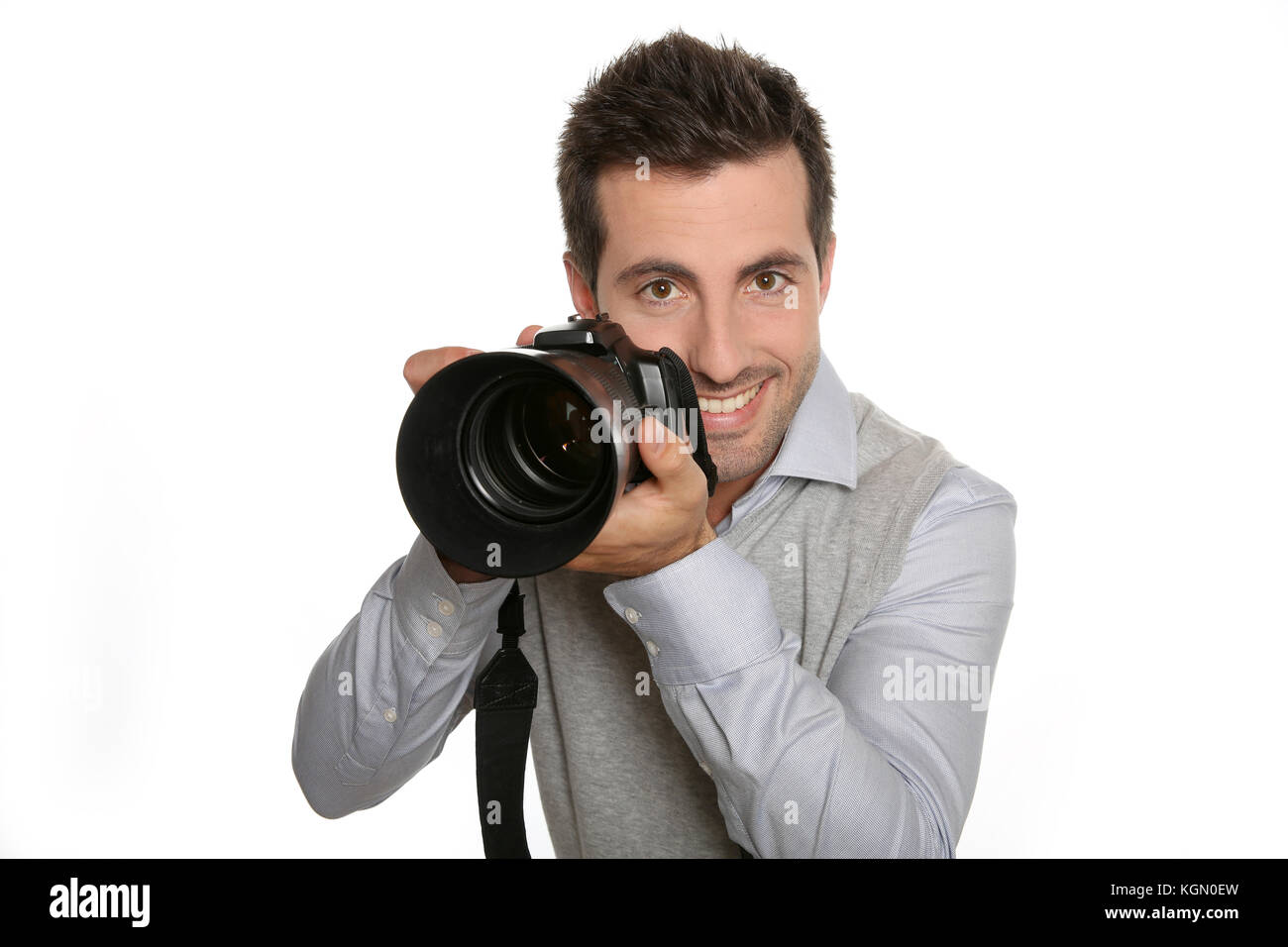 Portrait of photographer holding digital camera Stock Photo - Alamy