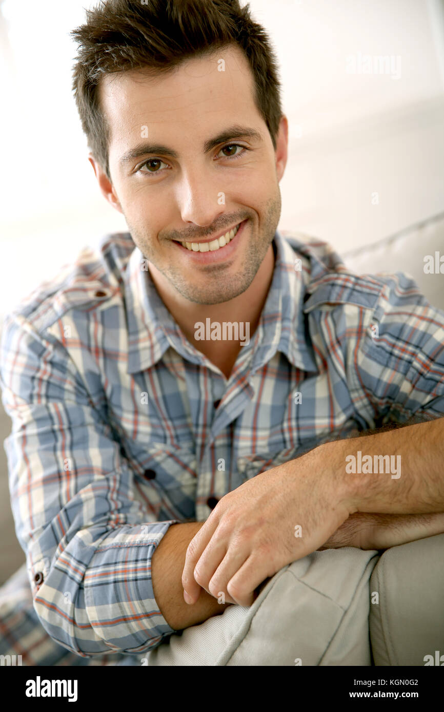 Portrait of handsome guy relaxing at home Stock Photo - Alamy