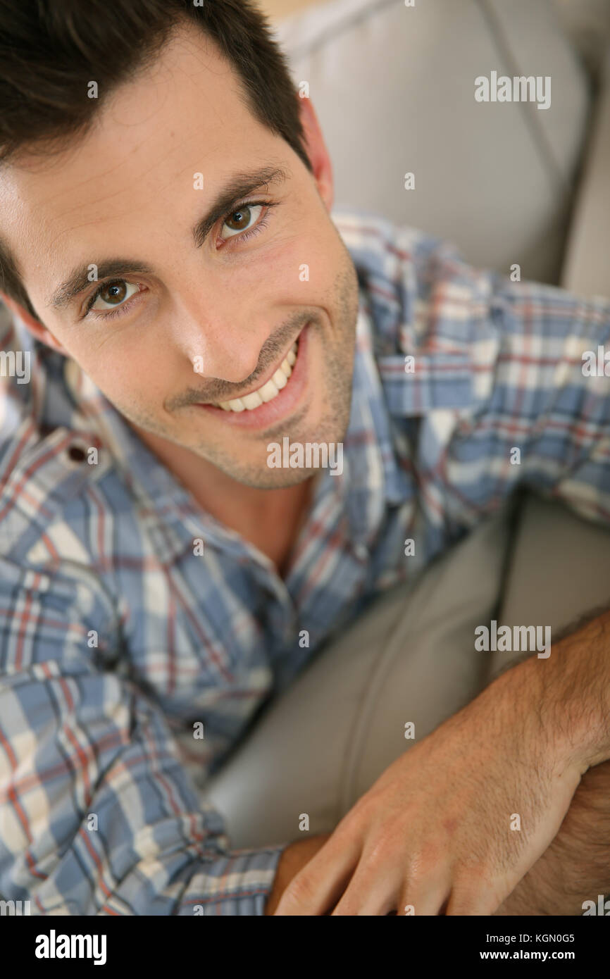 Portrait of handsome guy relaxing at home Stock Photo - Alamy