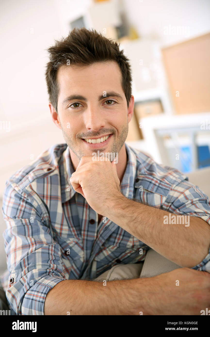 Portrait of handsome guy relaxing at home Stock Photo - Alamy