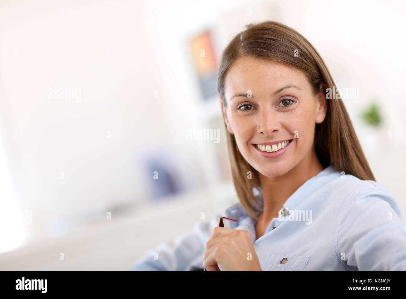 Portrait of beautiful woman relaxing at home Stock Photo - Alamy