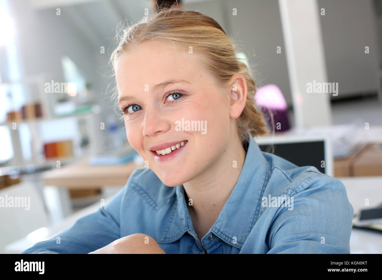 Portrait of smiling student girl in class Stock Photo - Alamy