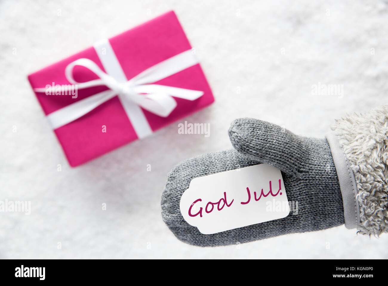 Pink Gift, Glove, God Jul Means Merry Christmas Stock Photo - Alamy