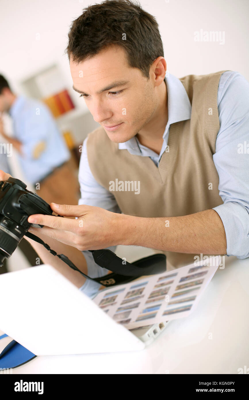 Journalist working in office Stock Photo - Alamy