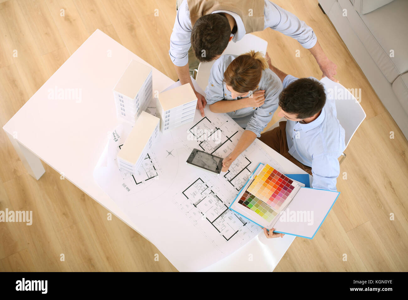 Upper view of architects working in office Stock Photo - Alamy