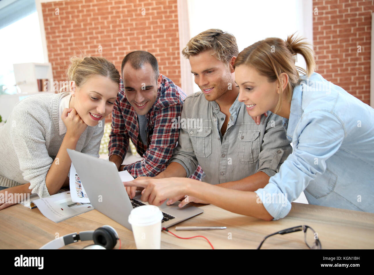 Roommates at home connected on internet Stock Photo - Alamy
