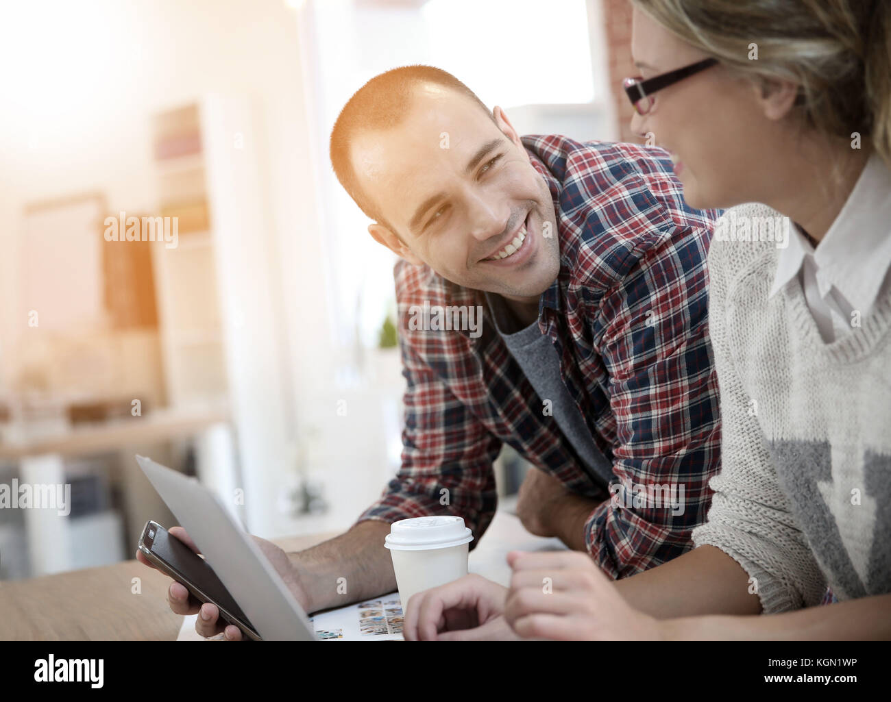Business people working on project in office Stock Photo - Alamy