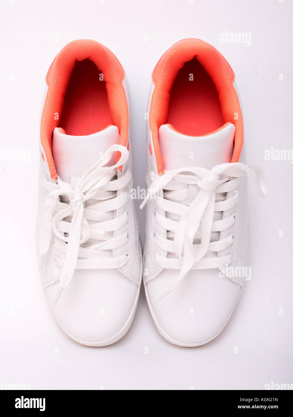 Pair of white sneakers isolated on white background. Sport shoes Stock ...