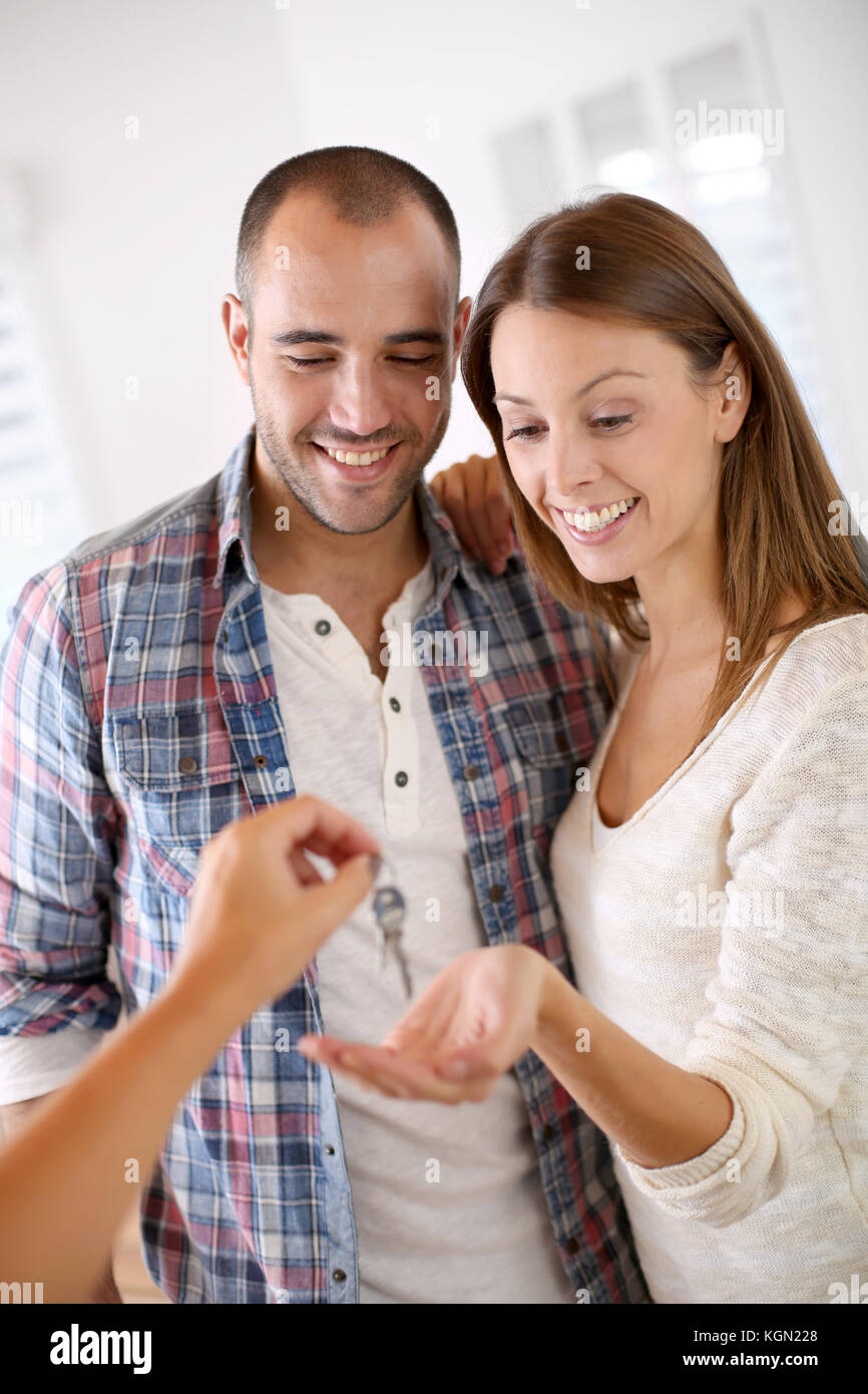 Woman getting house keys hi-res stock photography and images - Alamy