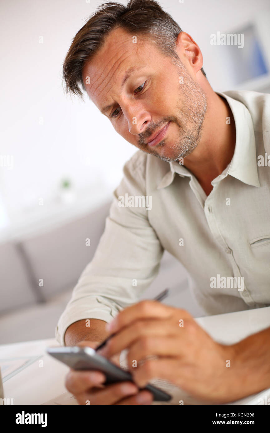 Smart handsome guy typing message hi-res stock photography and images ...