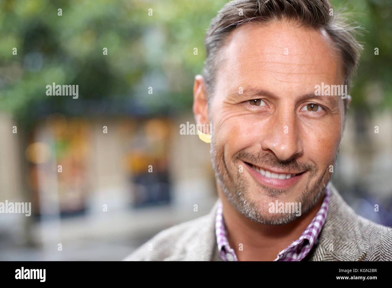 Trendy handsome guy in town Stock Photo - Alamy