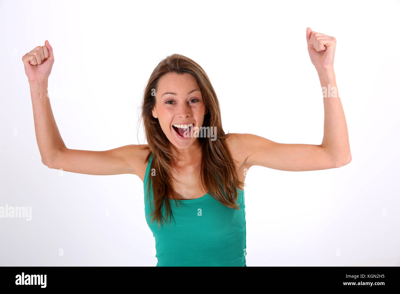Brunette girl lifting arms up Stock Photo - Alamy