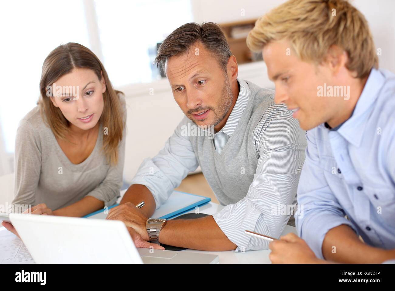 Business team working on project Stock Photo - Alamy